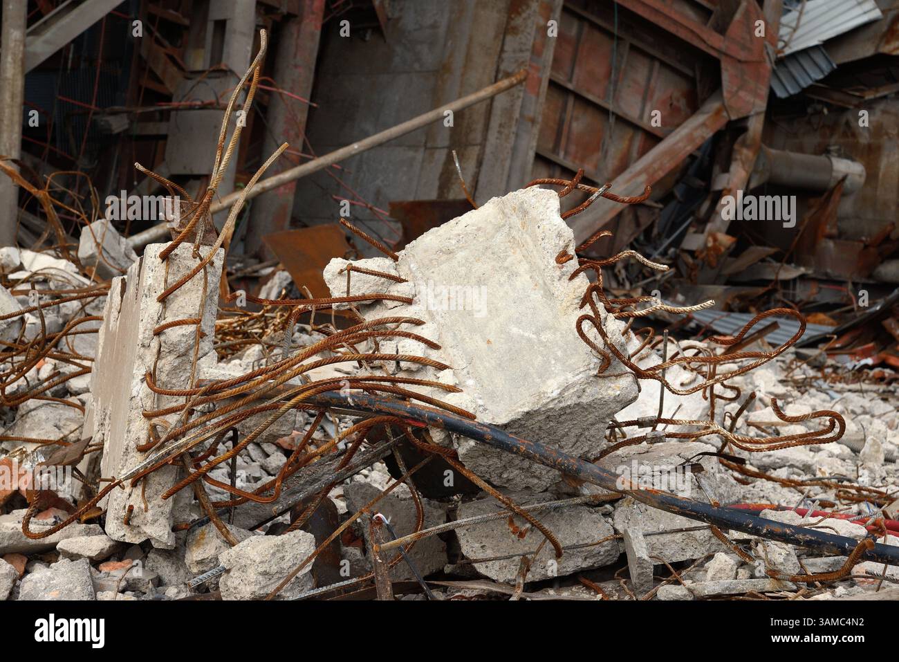 Pile of rubble with iron rods Stock Photo - Alamy