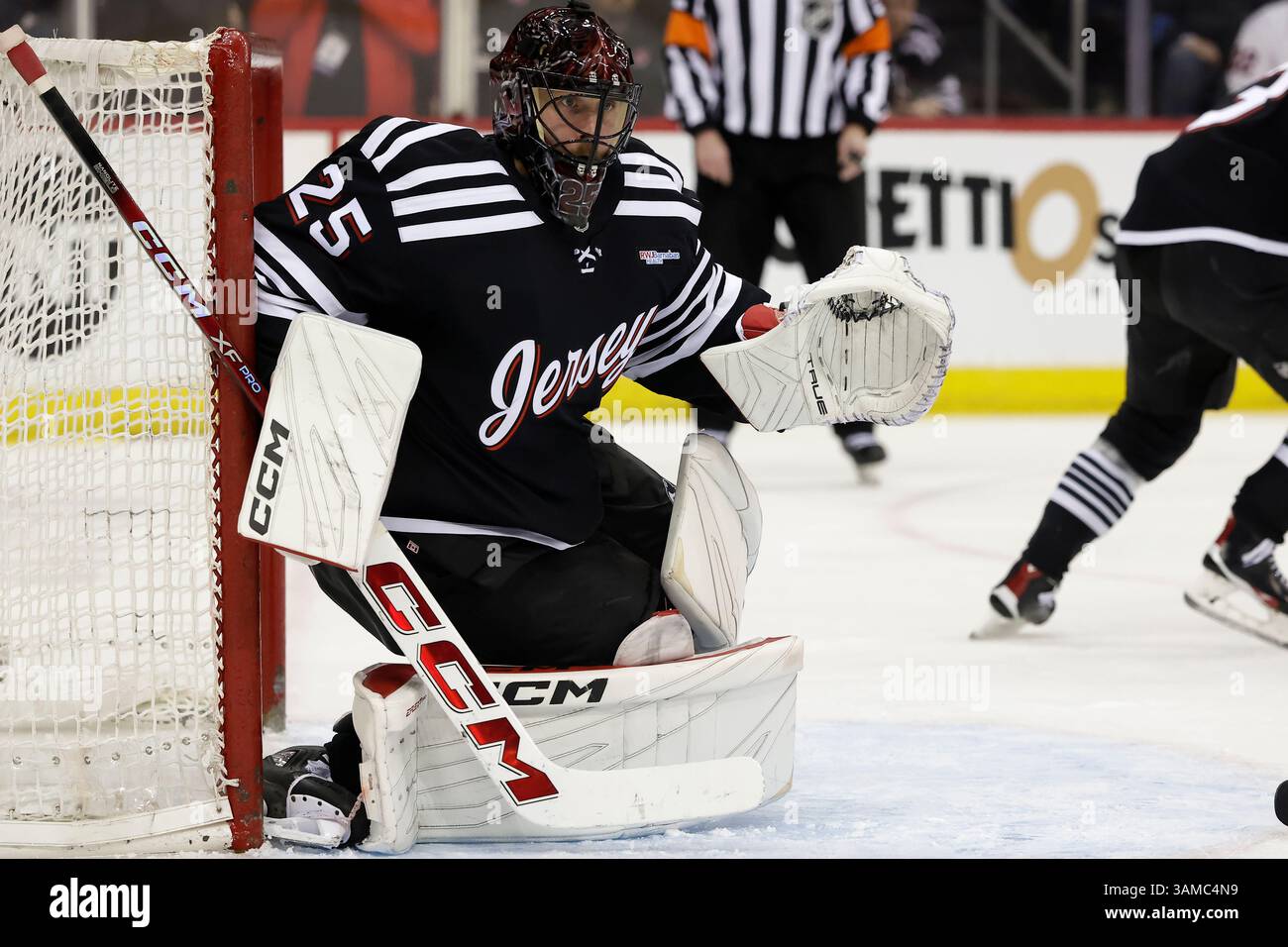 New Jersey Devils goaltender Jacob Markstrom defends his net in the ...