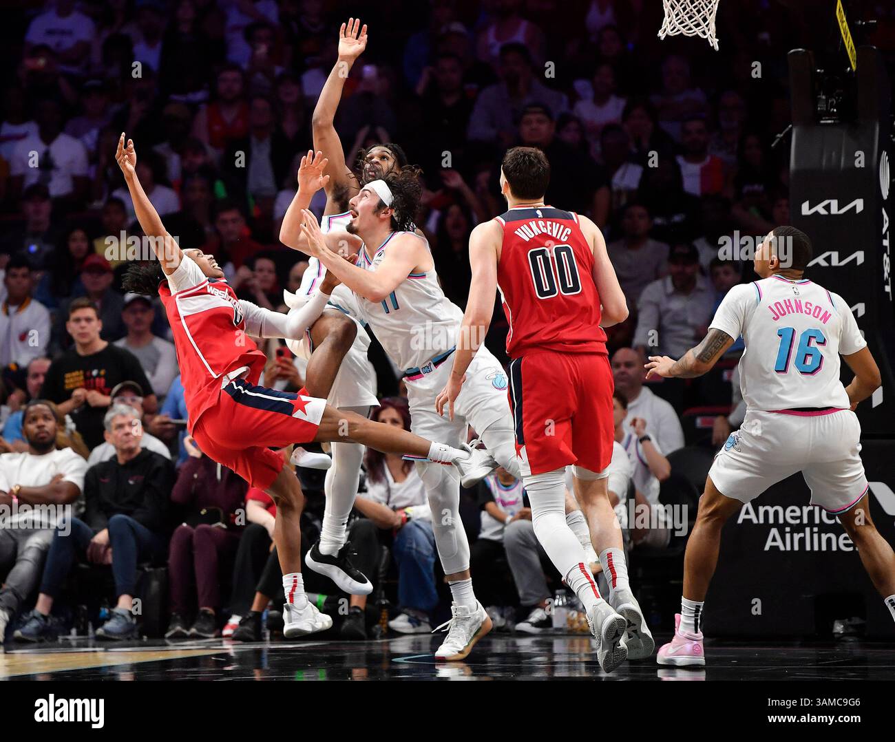 Washington Wizards guard Bub Carrington, left, takes a game-winning ...
