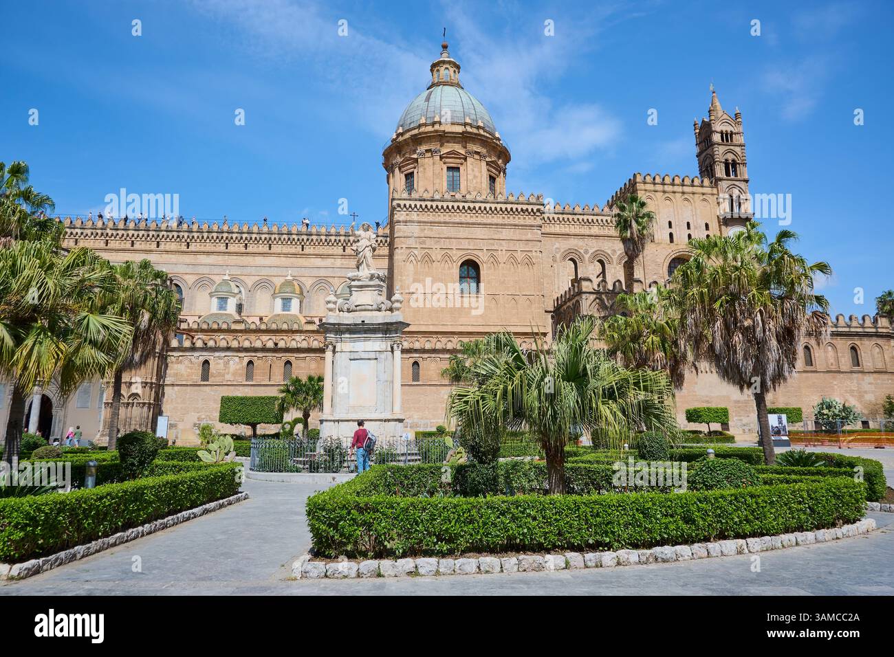 Stunning view of historic cathedral and gardens under a clear blue sky ...