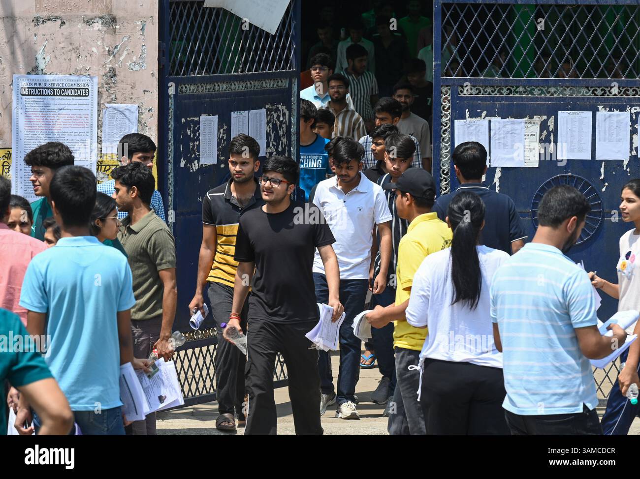 NOIDA, INDIA - APRIL 13: Candidates exit the examination center after ...
