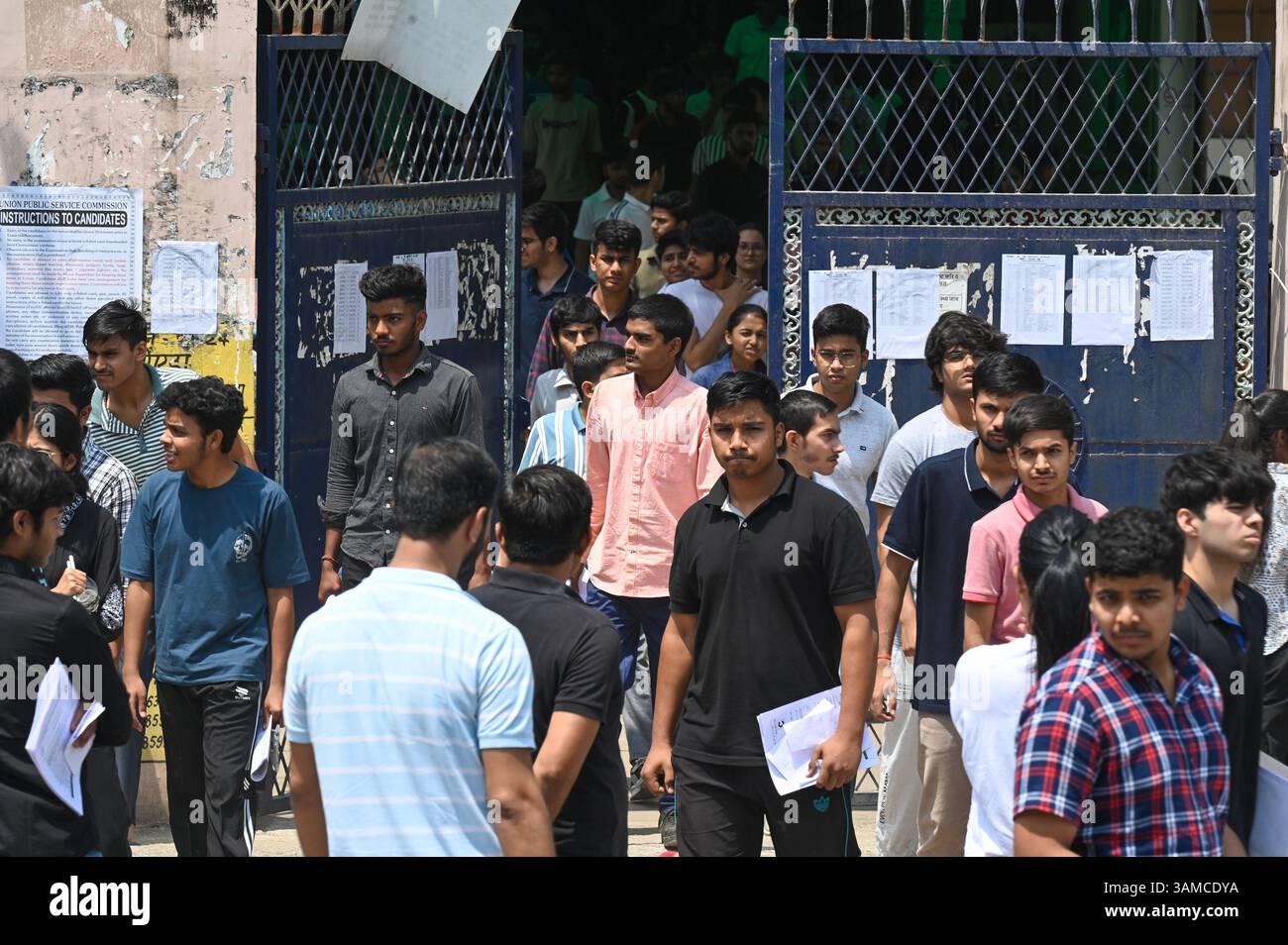 NOIDA, INDIA - APRIL 13: Candidates exit the examination center after ...