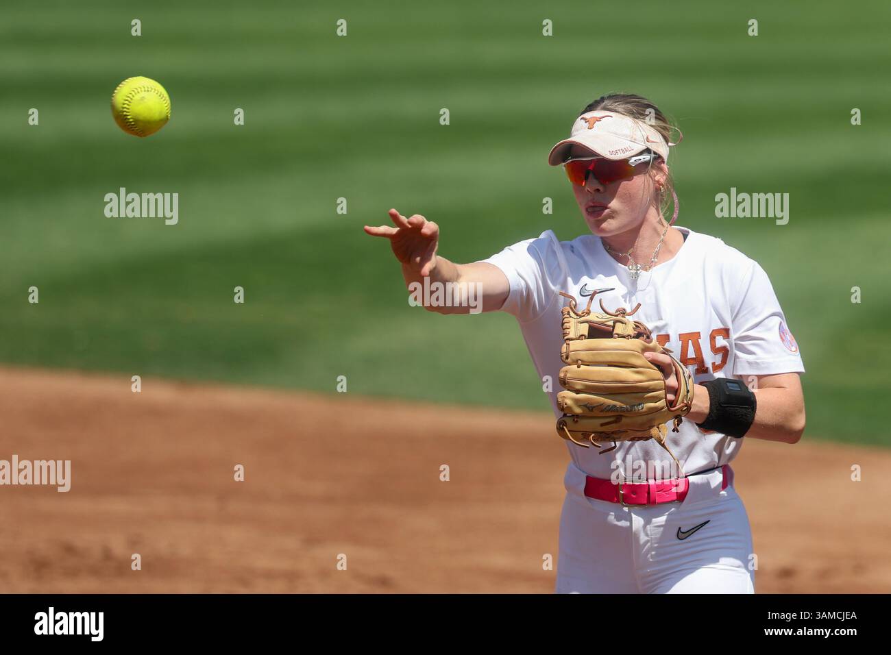 AUSTIN, TX - APRIL 13: Texas utility Kaydee Bennett (5) throws out a ...