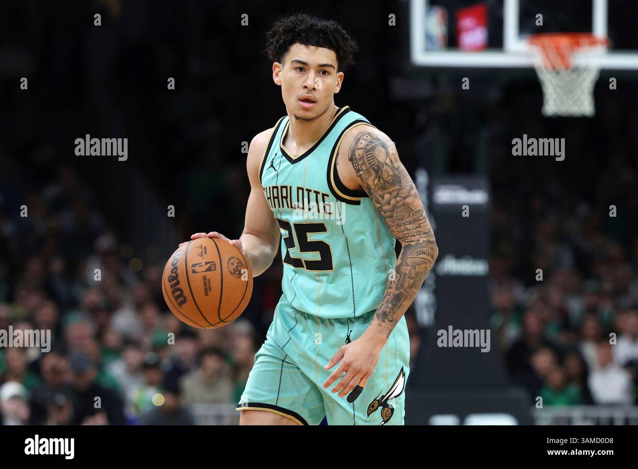 Charlotte Hornets' KJ Simpson plays against the Boston Celtics during ...