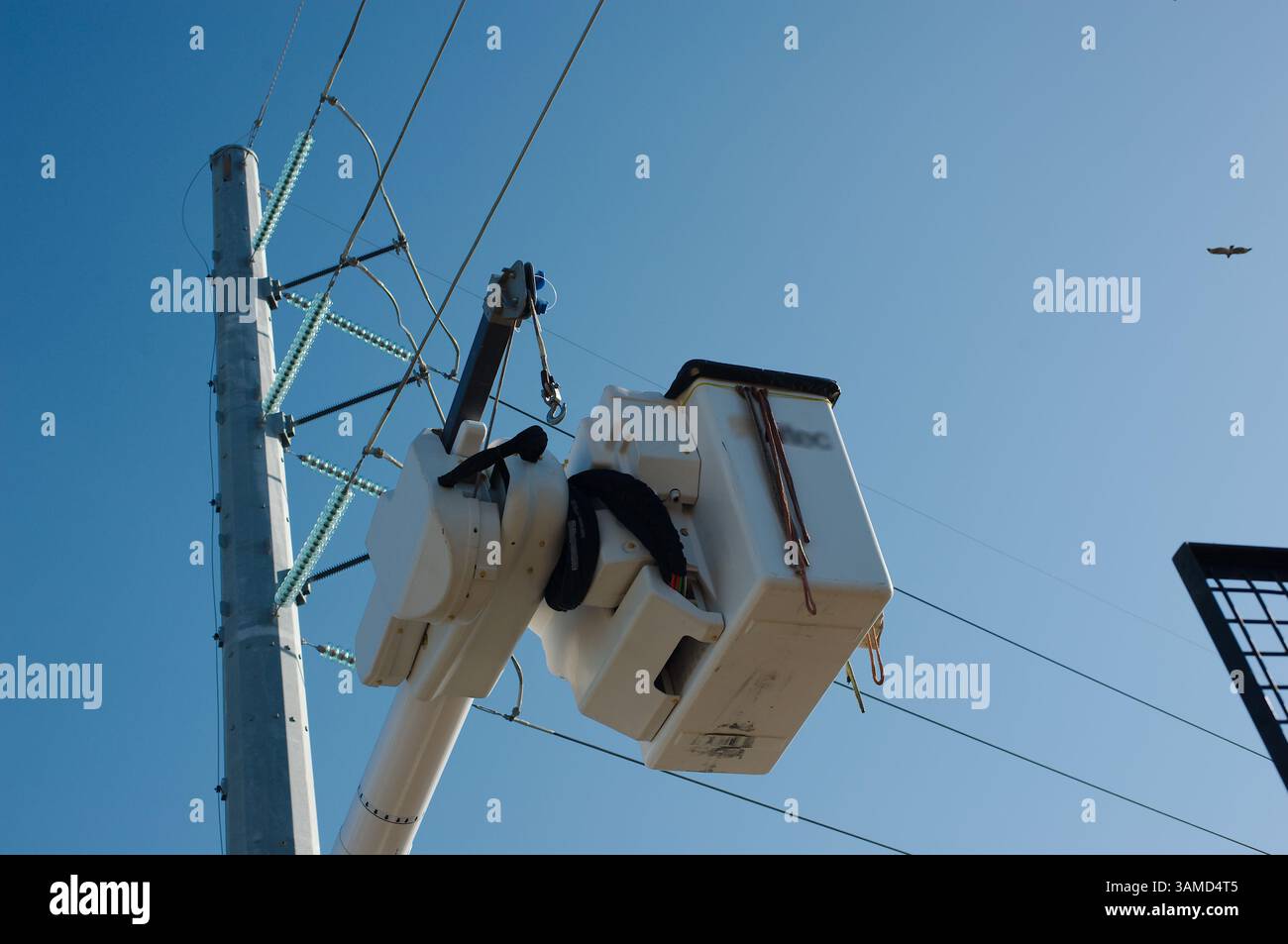 Utility Maintenance Truck Near Power Lines Under Clear Blue Sky ...