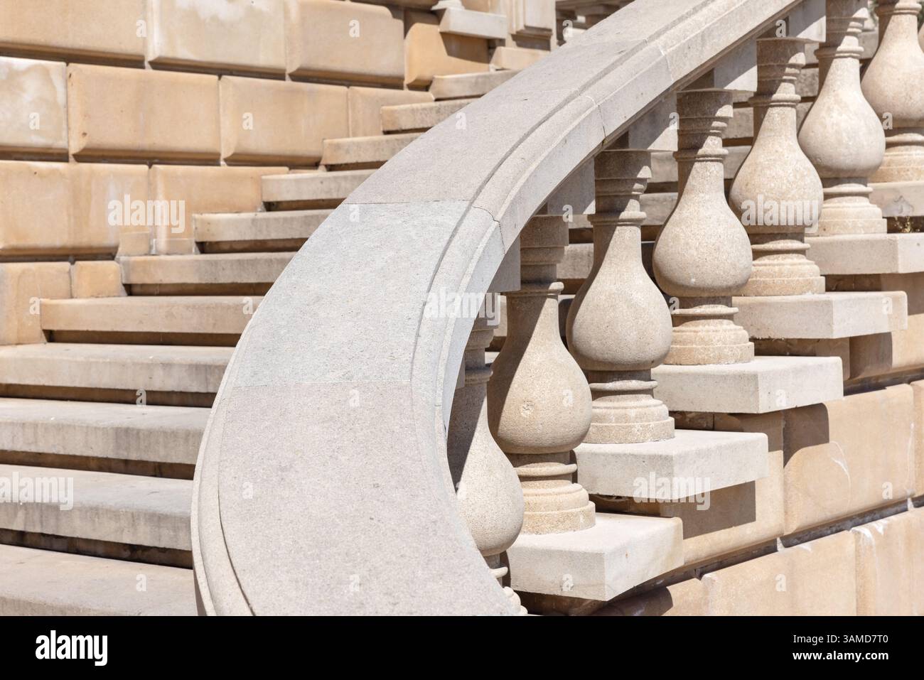 Turning stone staircase with a beautifully designed balustrade ...