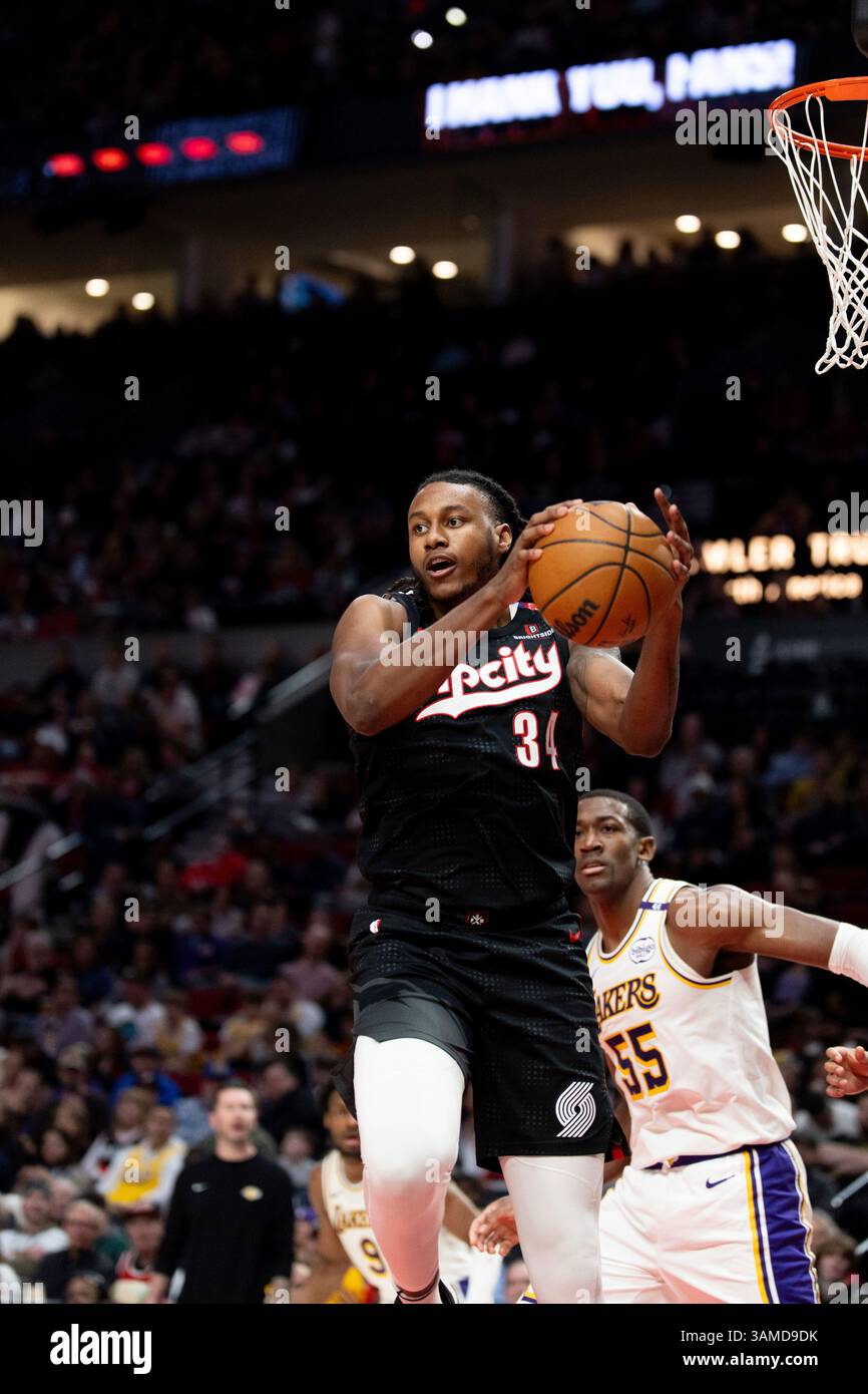 Portland Trail Blazers forward Jabari Walker, left, grabs a rebound ...