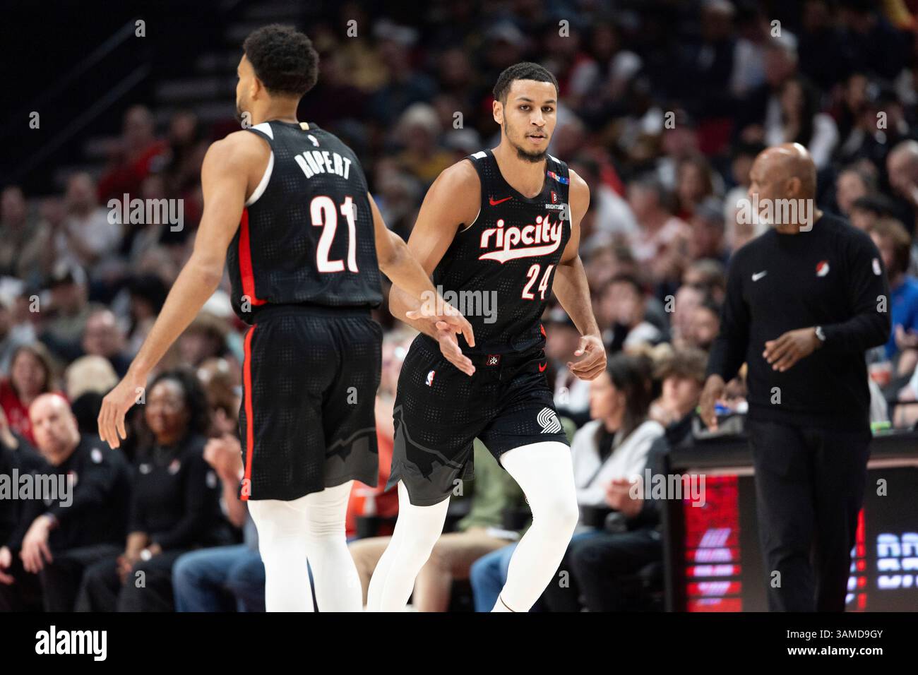 Portland Trail Blazers forward Kris Murray, right, celebrates the made ...