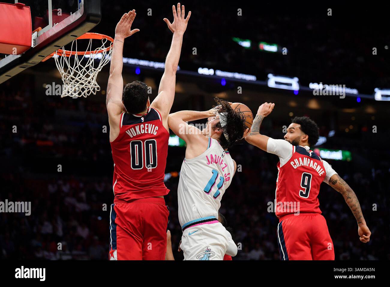 Miami Heat guard Jaime Jaquez Jr. (11) shoots in between Washington ...