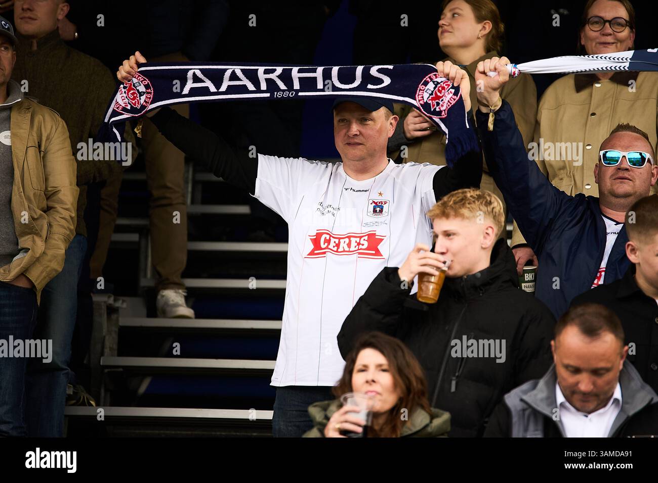Aarhus, Denmark. 13th Apr, 2025. Football fans of AGF seen on the ...