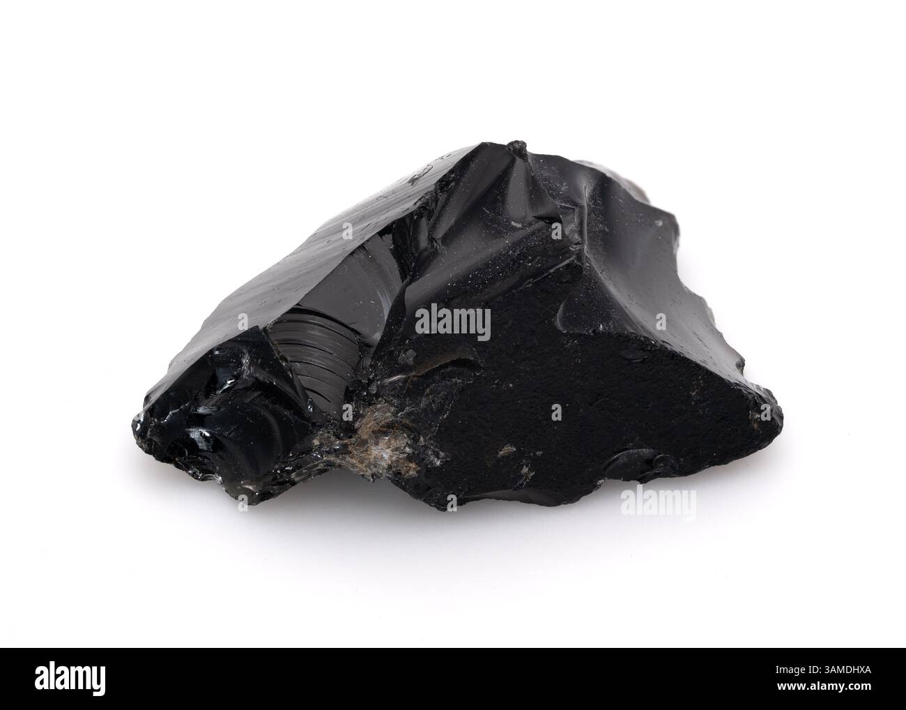 Black obsidian rock isolated on white background, volcanic glass with ...