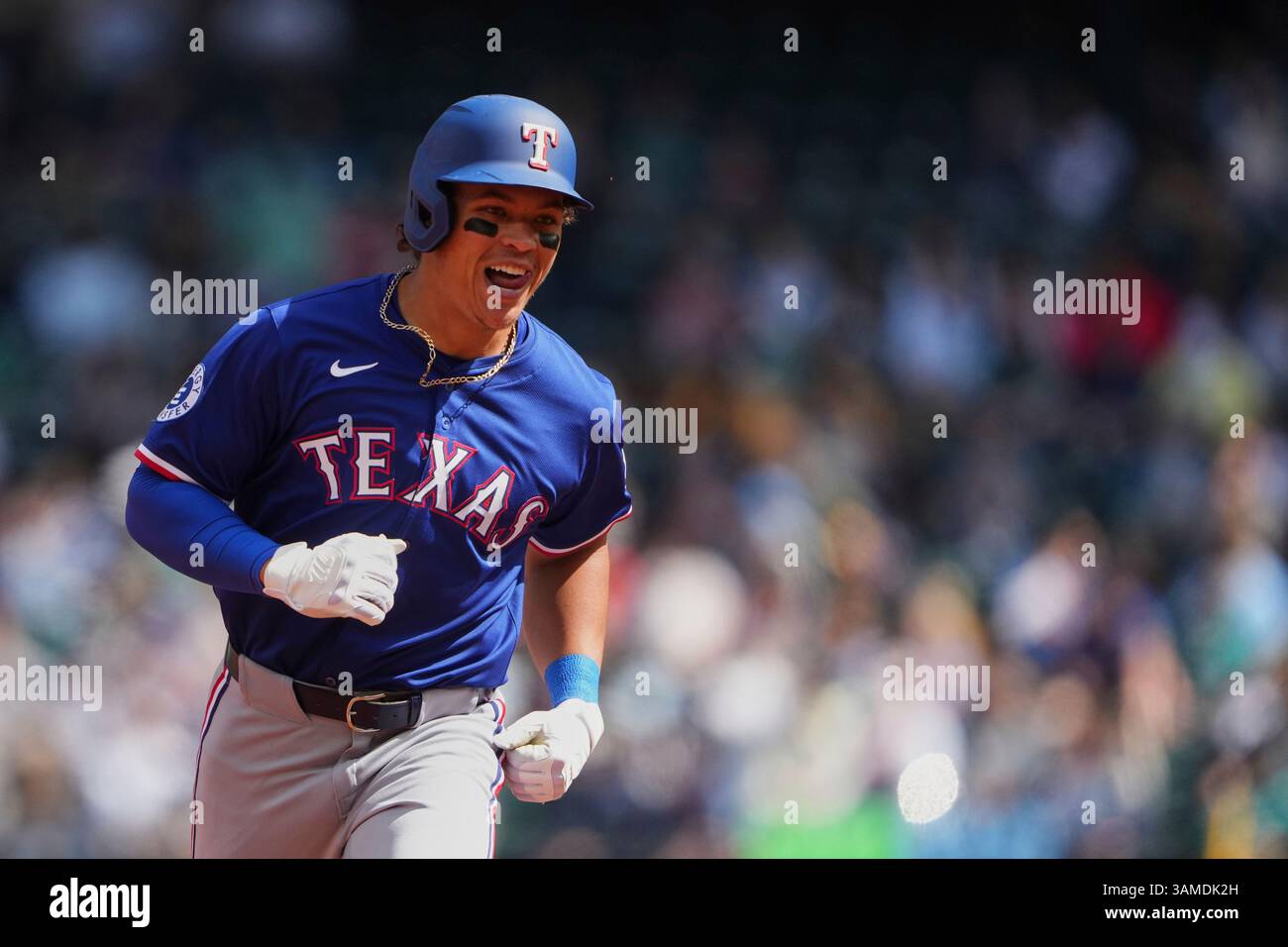 Texas Rangers' Dustin Harris jogs the bases after hitting a solo home ...