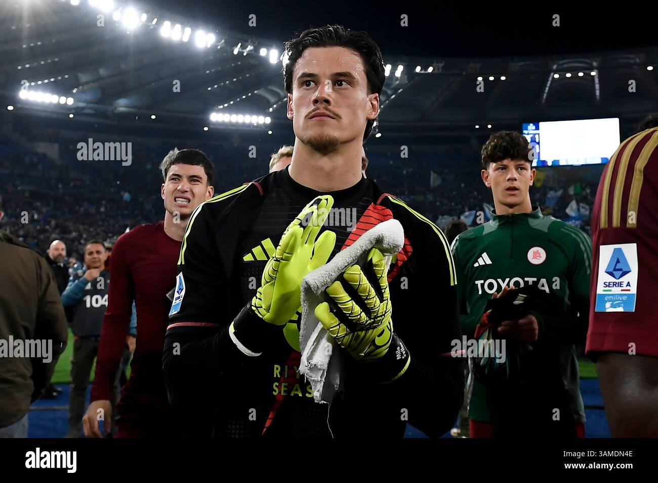Rome, Italy. 13th Apr, 2025. Mile Svilar of AS Roma claps the ...