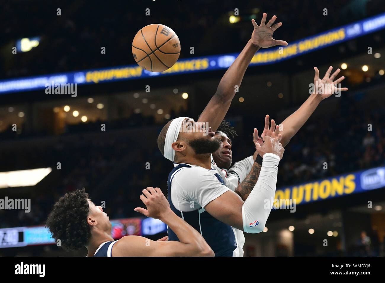 Dallas Mavericks guard Max Christie, from left, center Daniel Gafford ...