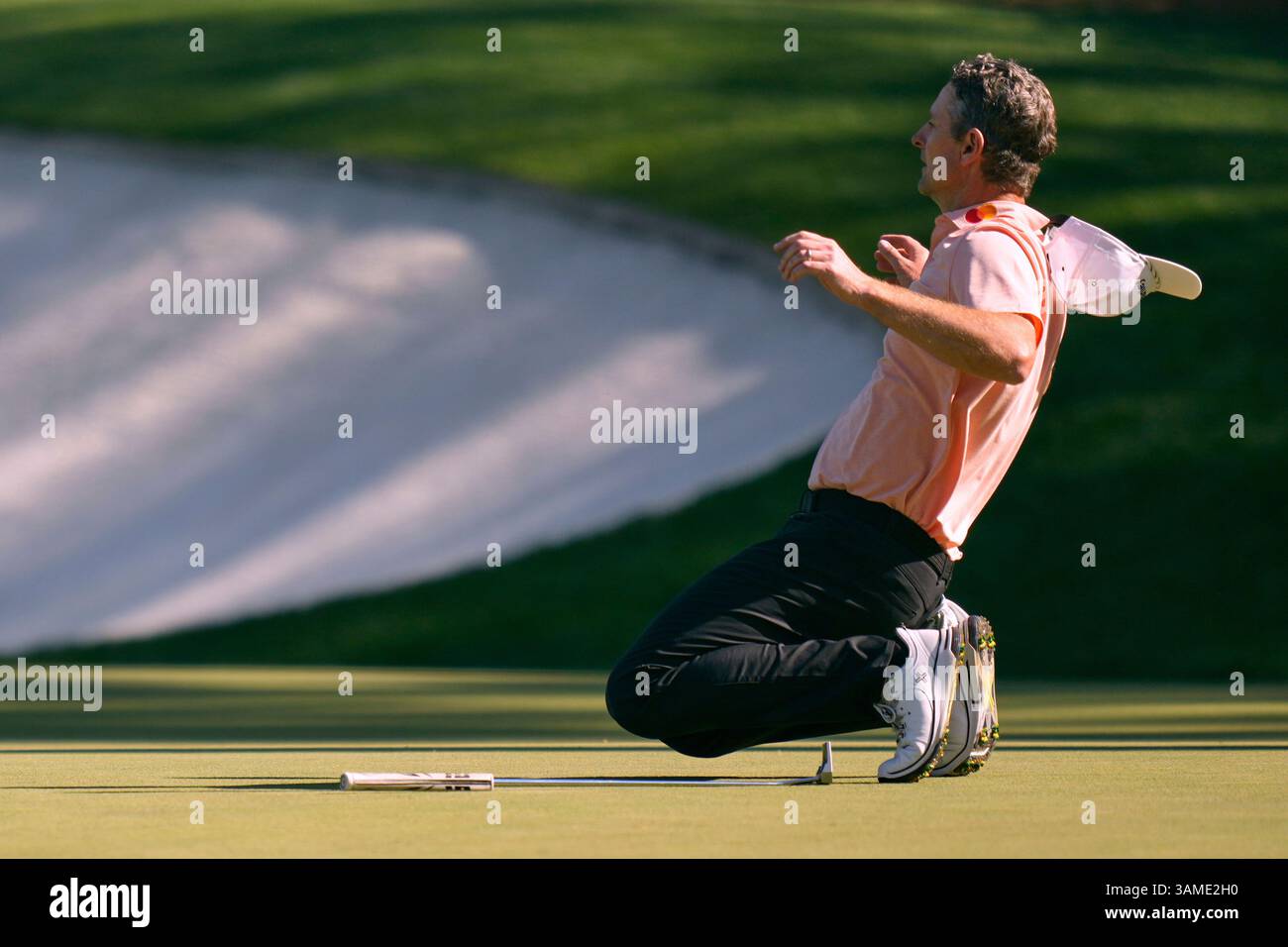 Justin Rose reacts after missing an eagle putt on the 13th hole during ...