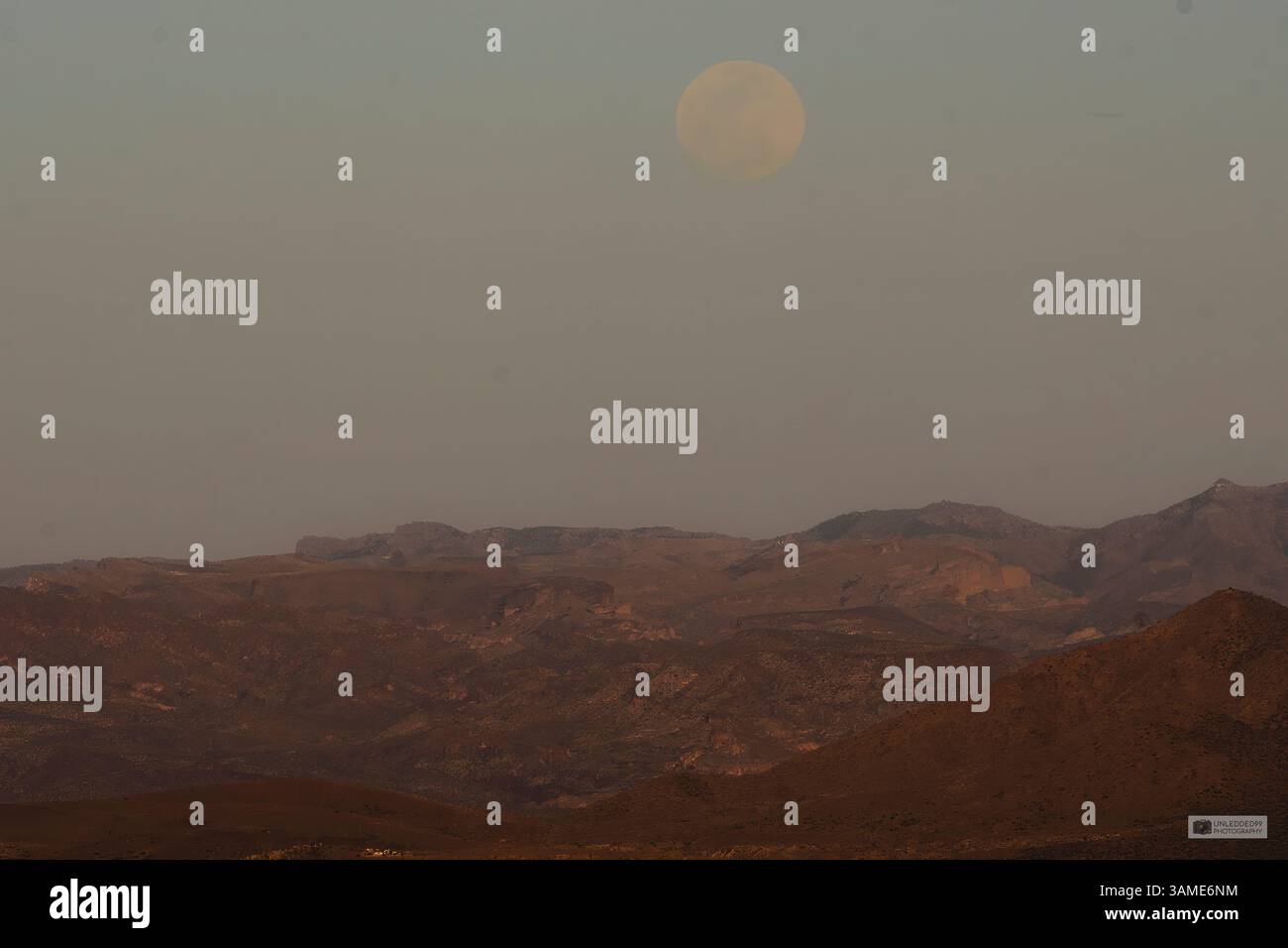 The Full Moon Rises In The Late Afternoon Arizona Sky Stock Photo - Alamy