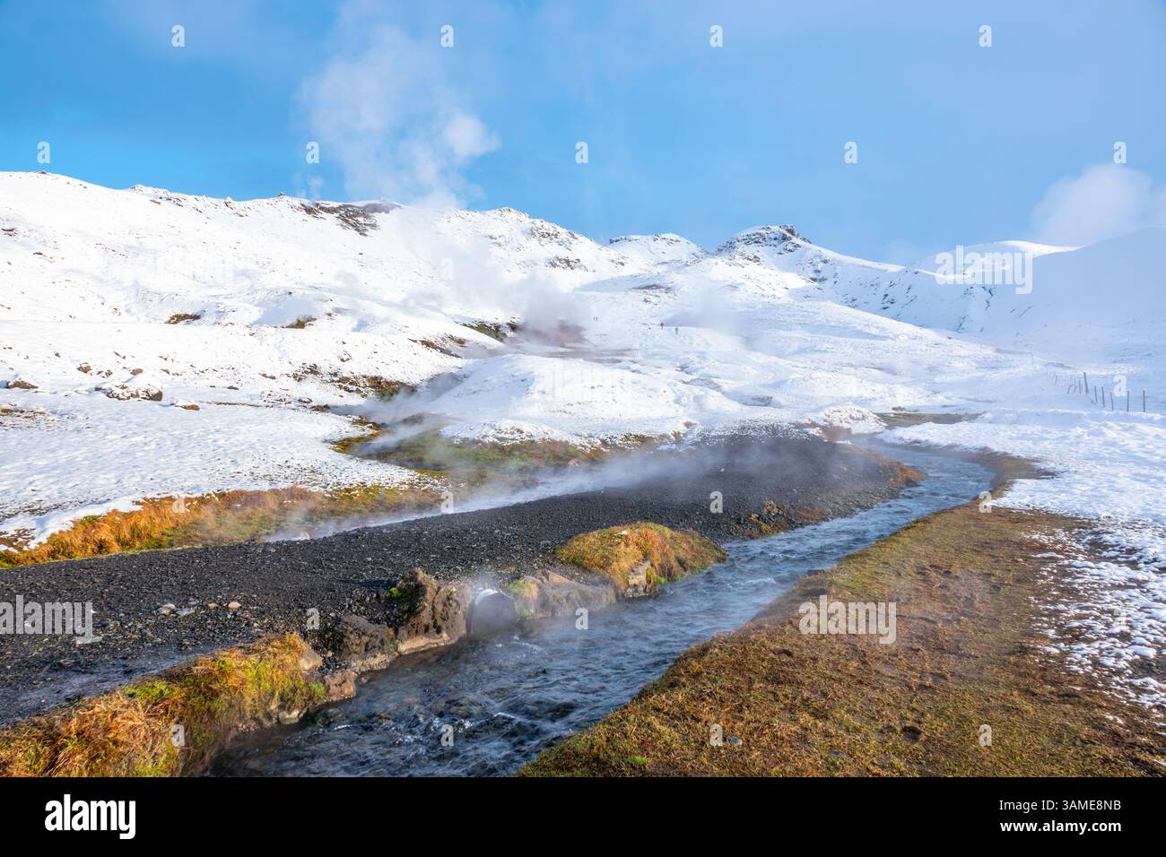 Icelandic hot springs in the snow Stock Photo - Alamy