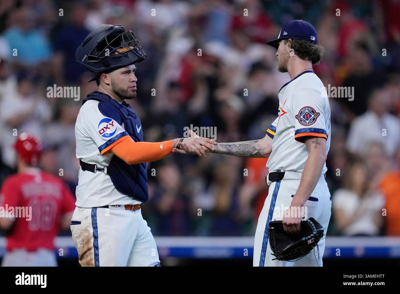 Houston Astros catcher Victor Caratini (17) and pitcher Josh Hader (71 ...