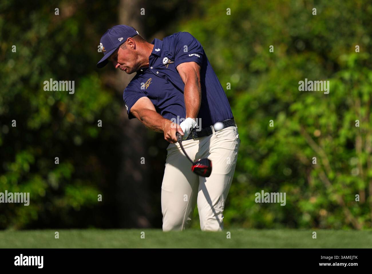 Bryson DeChambeau hits his tee shot on the 11th hole during the final ...