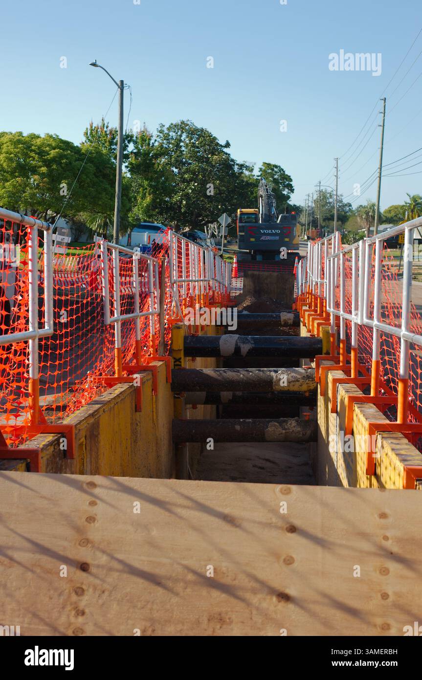 Urban Construction Worksite Featuring Excavation and Utility ...