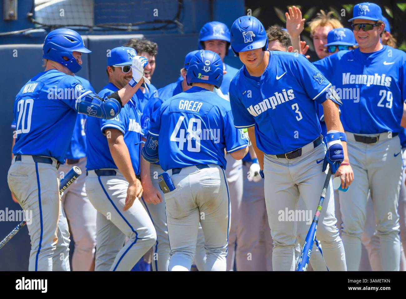 Memphis outfielder Cade Greer (48) celebrates scoring a run with ...