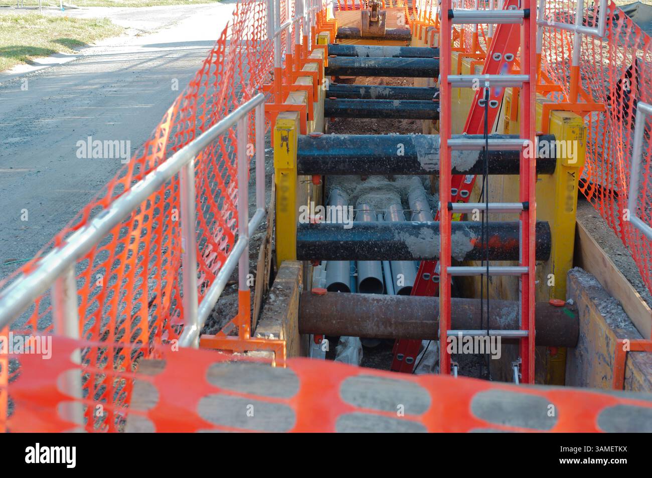 Urban Construction Worksite Featuring Excavation and Utility ...