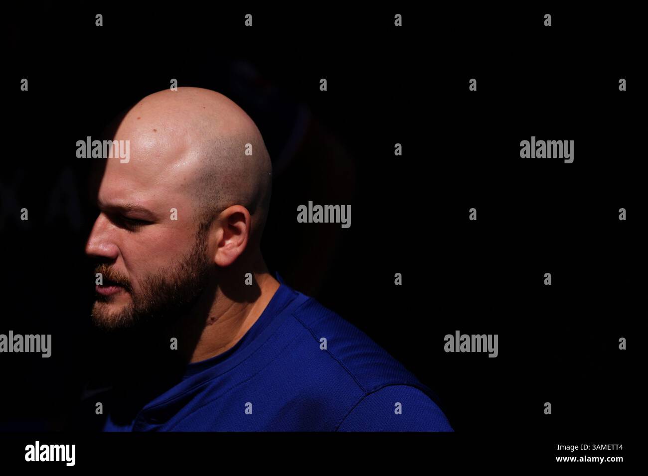 Texas Rangers first baseman Jake Burger walks in the dugout before ...