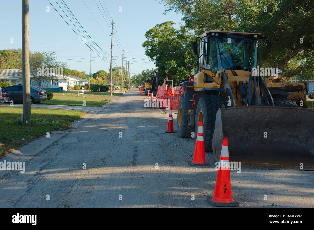 Road Construction Trench repair Site with Orange Barriers and Safety ...