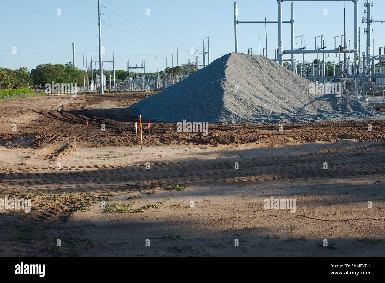 Gravel Pile at utility Construction Site with Electric Substation ...
