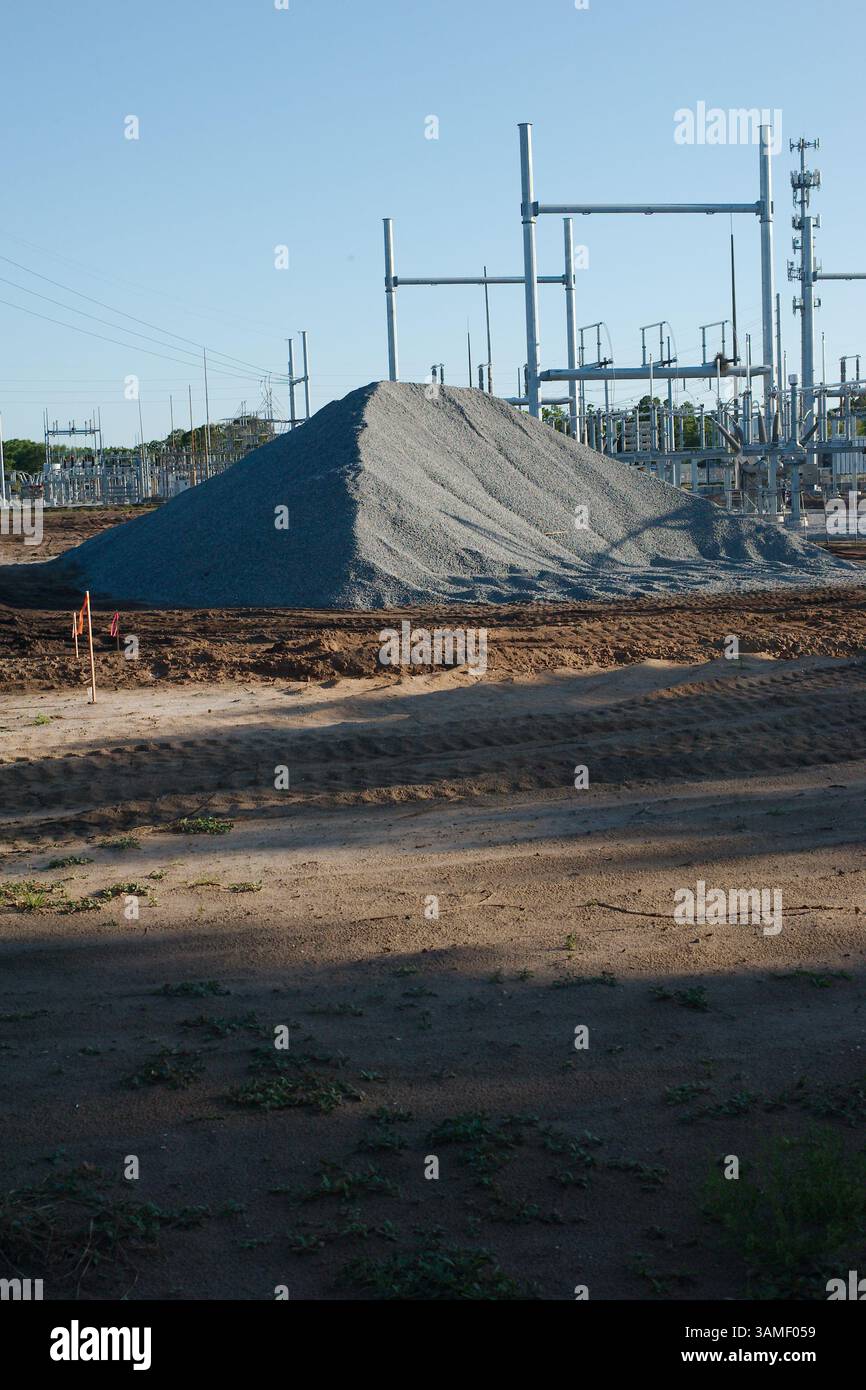 Gravel Pile at utility Construction Site with Electric Substation ...