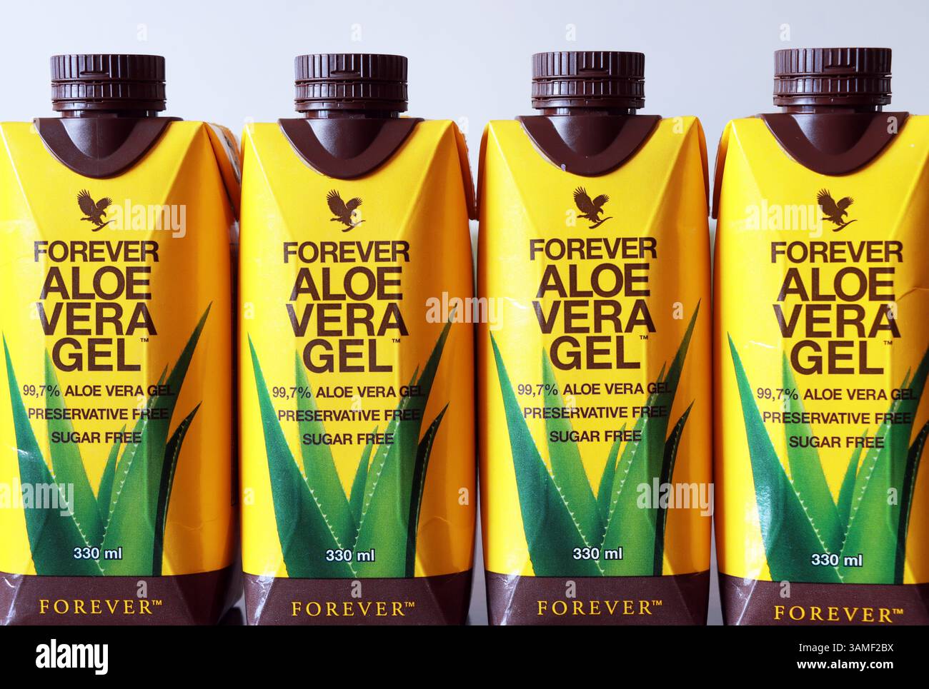 Aloe vera gel bottles display with health benefits highlighted on ...