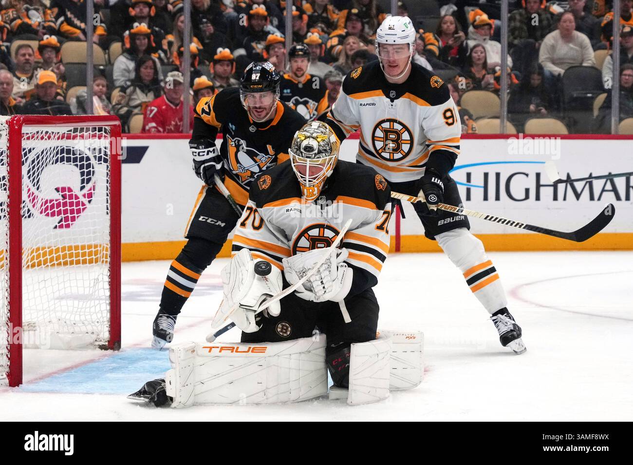 Boston Bruins goaltender Joonas Korpisalo (70) blocks a shot during the ...