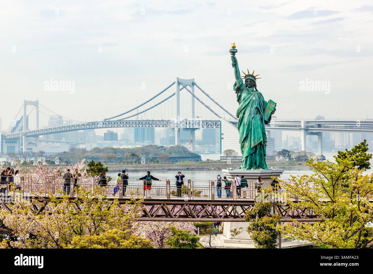 Statue of Liberty replica and Rainbow Bridge in Tokyo Bay connecting ...