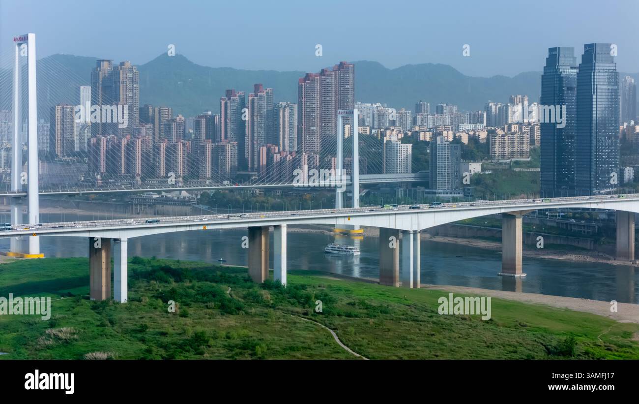 CHONGQING, CHINA - APRIL 13, 2025 - Tourists camp on Jiangxin island as ...
