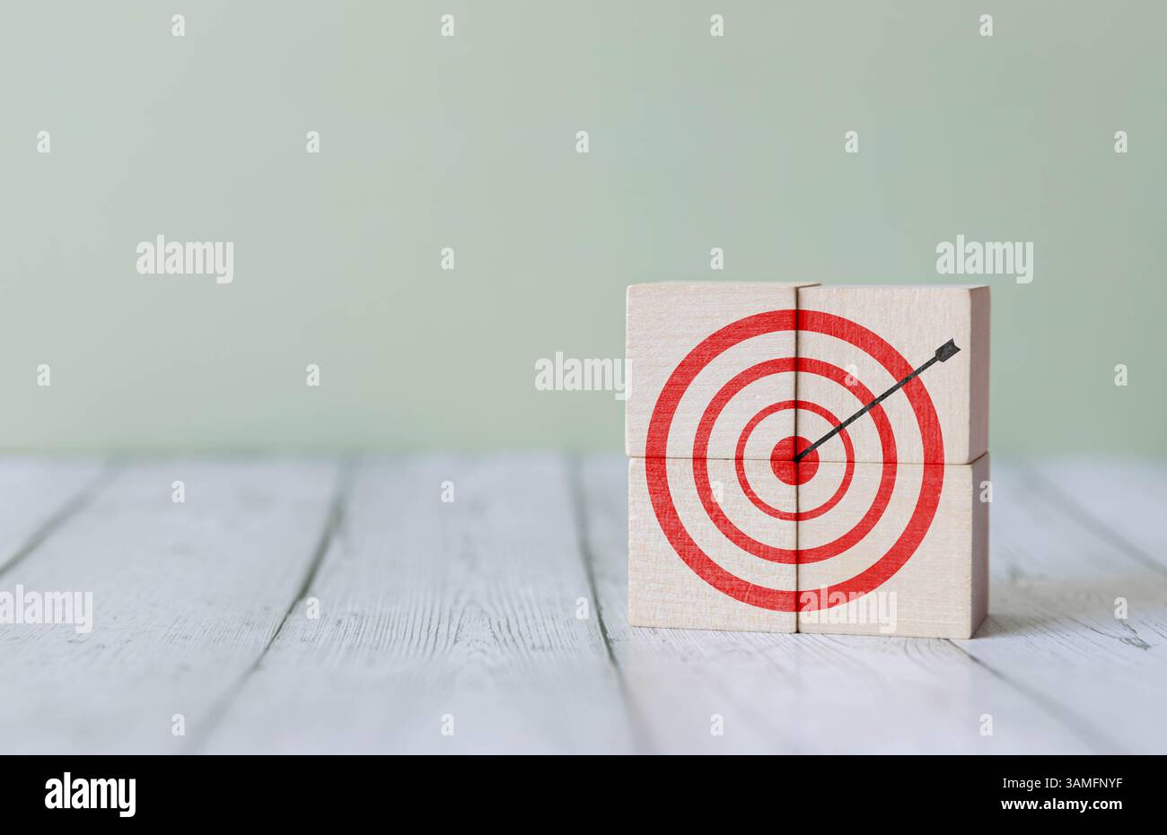 Target icon on top of wooden blocks with rise up arrows, 3d bar graph ...