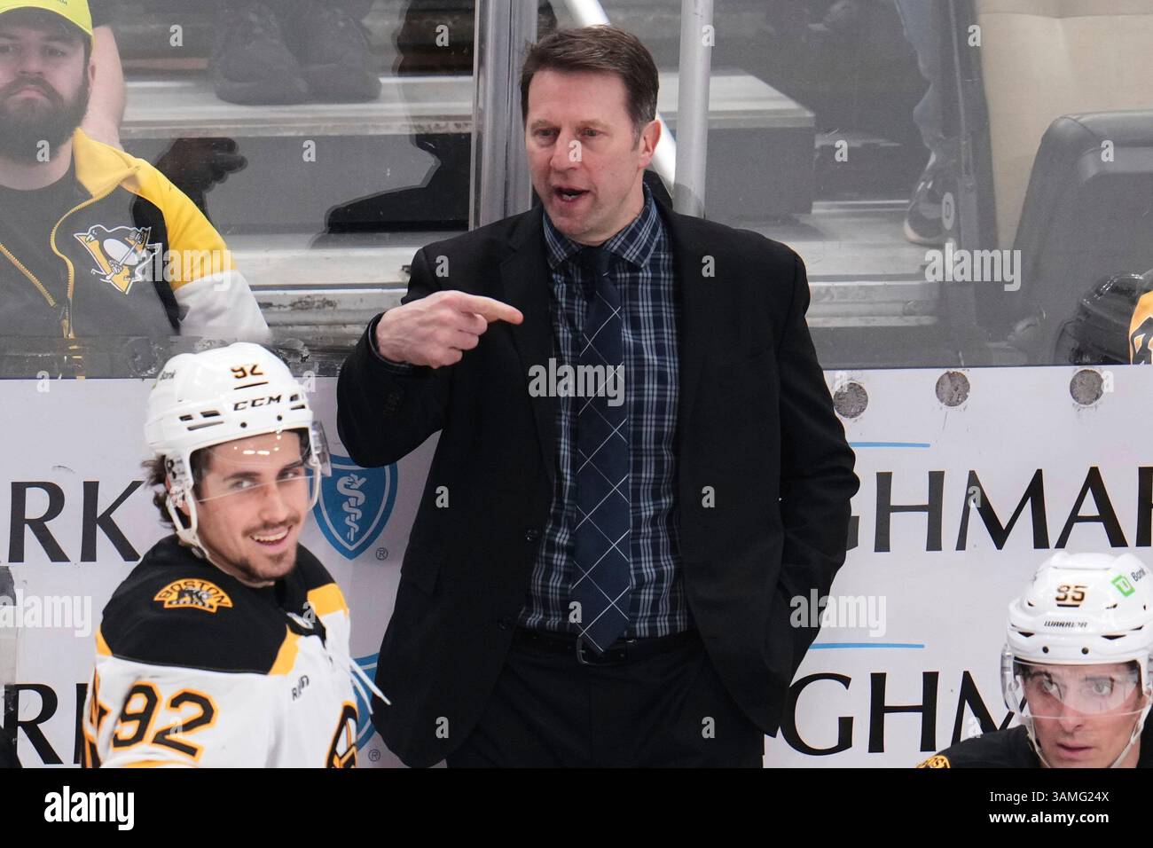 Boston Bruins interim head coach Joe Sacco gives instructions from ...