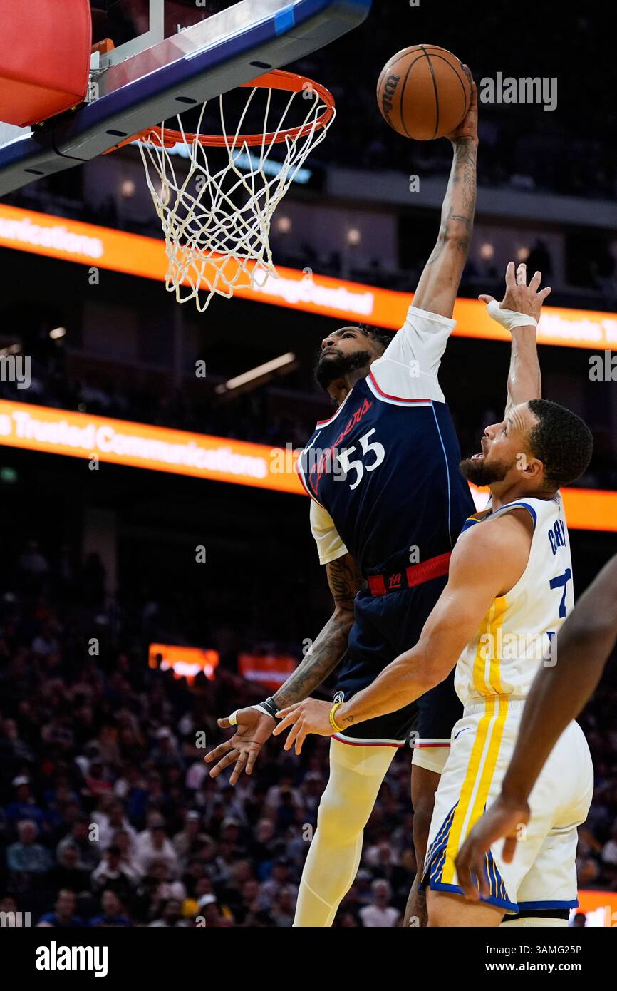 Los Angeles Clippers forward Derrick Jones Jr. (55) dunks next to ...