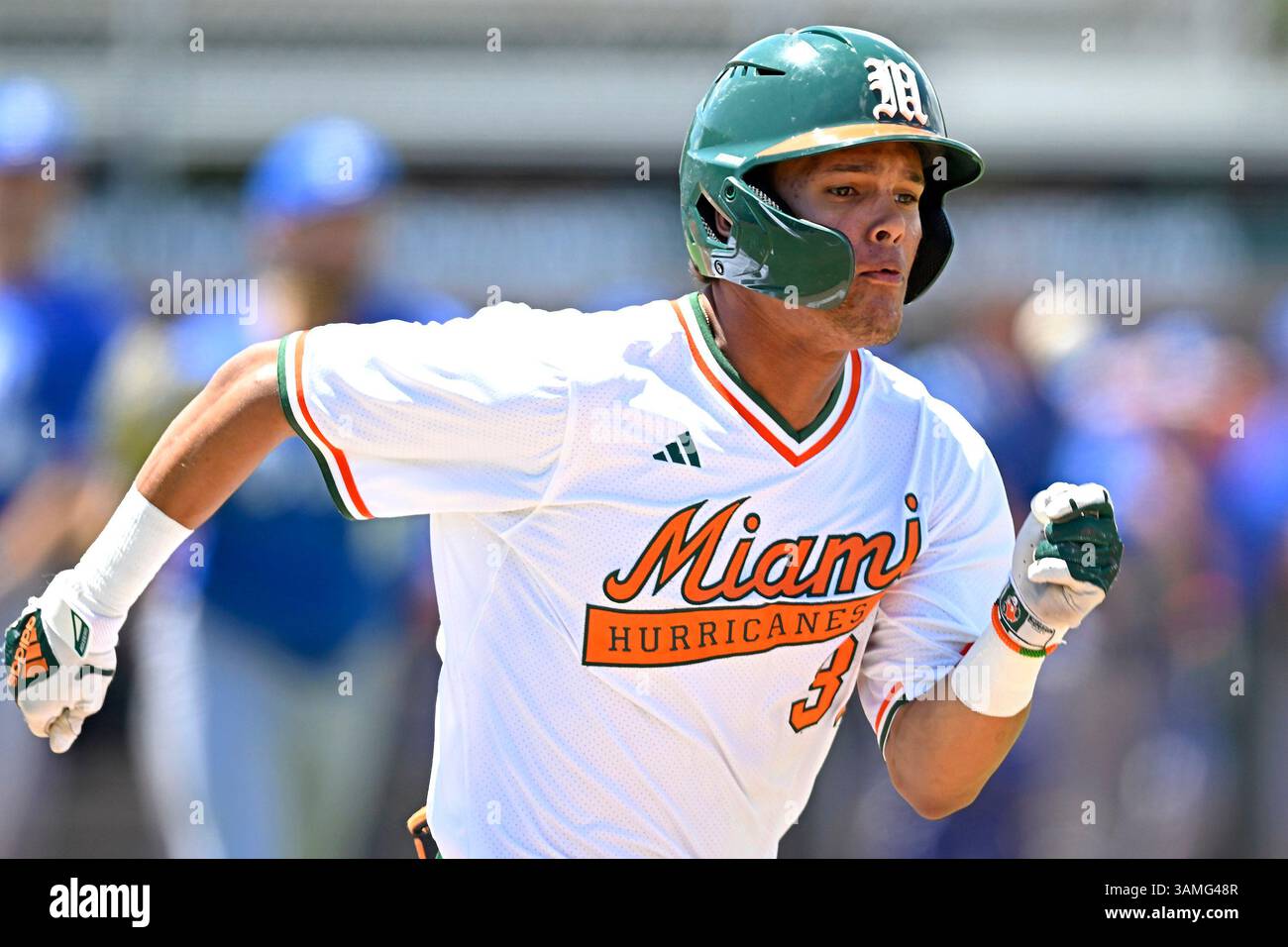 CORAL GABLES, FL - APRIL 13: Miami outfielder Fabio Peralta (37) runs ...