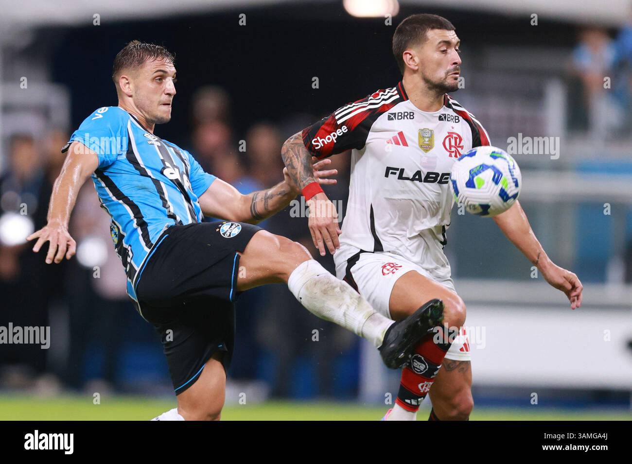 Porto Alegre, Brazil. 13th Apr, 2025. Camilo of Gremio battles for ...