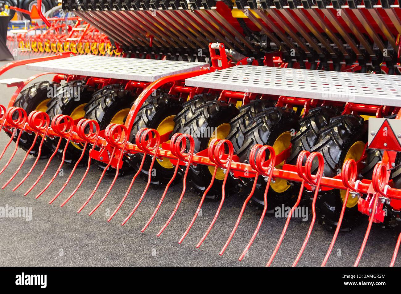 New equipment trailer seeder for tractor, seeder. Exhibition of new ...
