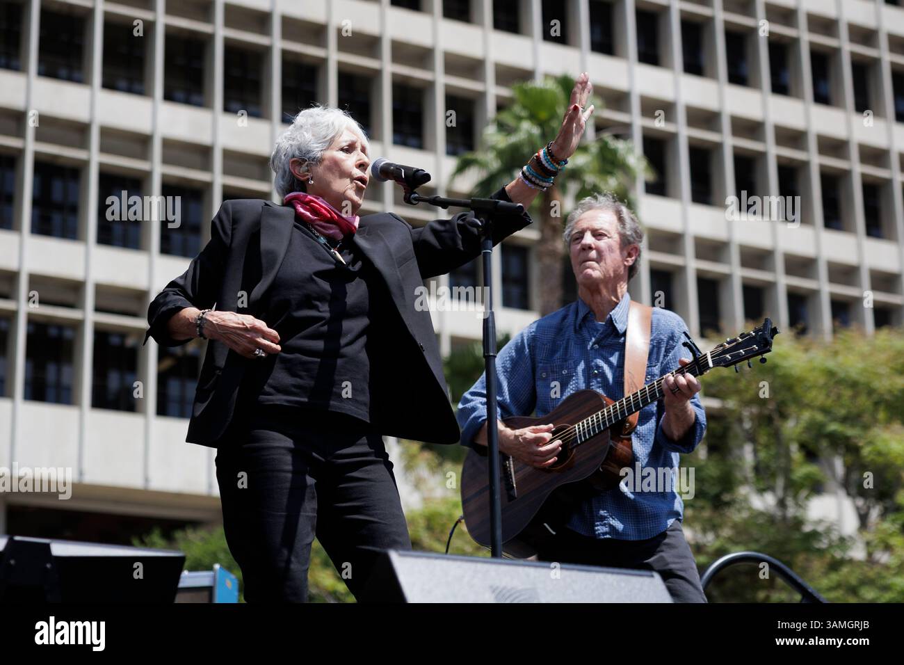Joan Baez sings during the Fight Oligarchy rally hosted by Senator ...