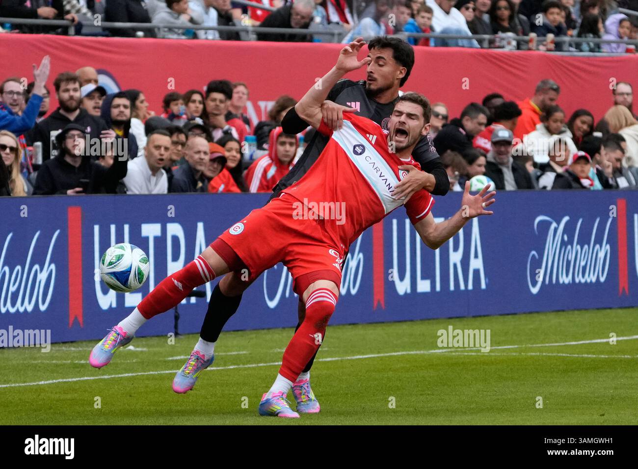 Chicago Fire forward Hugo Cuypers, front, is defended by Inter Miami ...