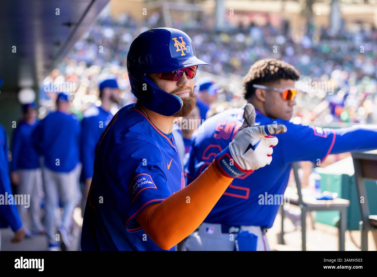 New York Mets' Brandon Nimmo (9) celebrates in the dugout after scoring ...