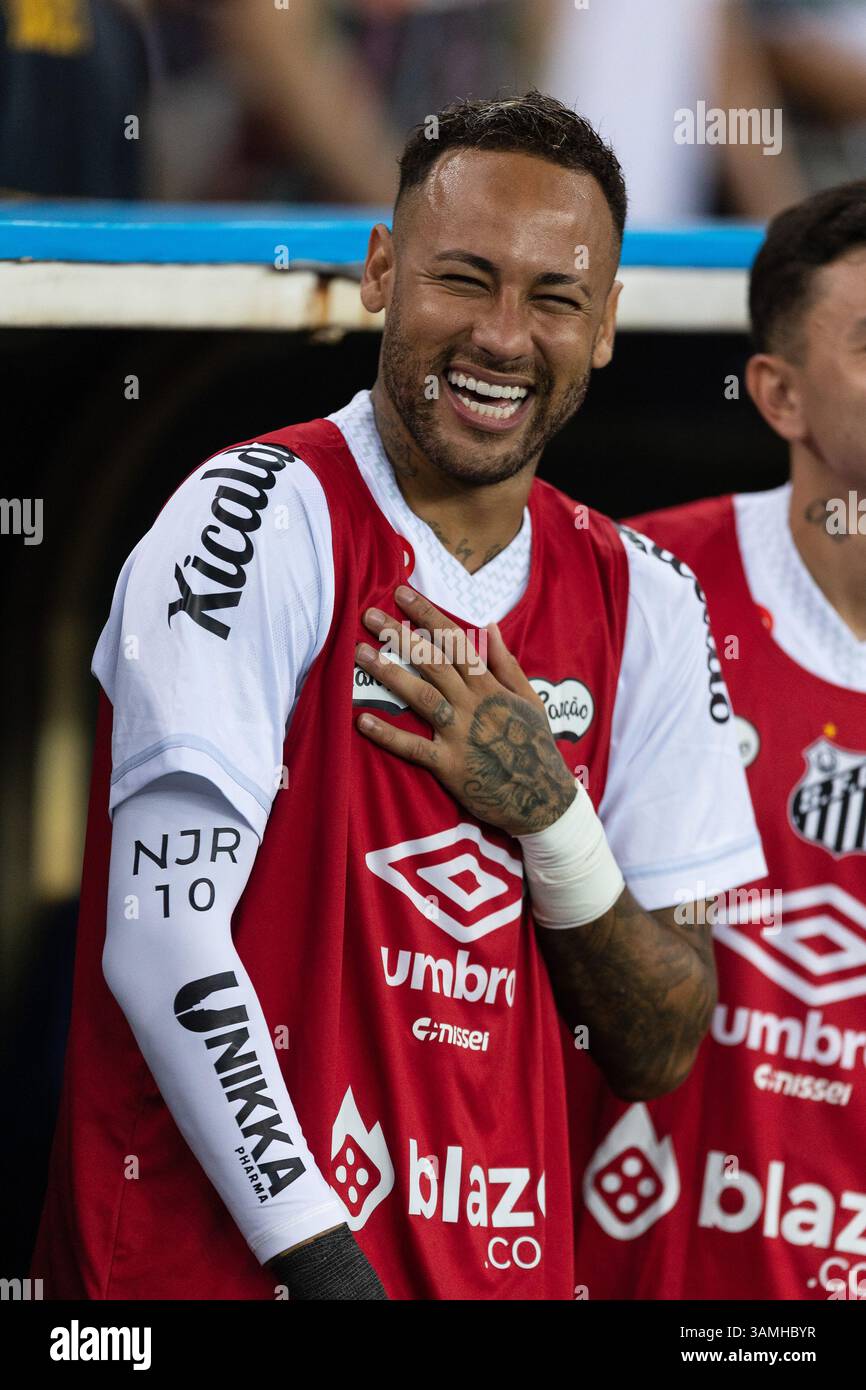 RIO DE JANEIRO, BRAZIL - APRIL 13: NEYMAR of Santos smiles at the bench ...