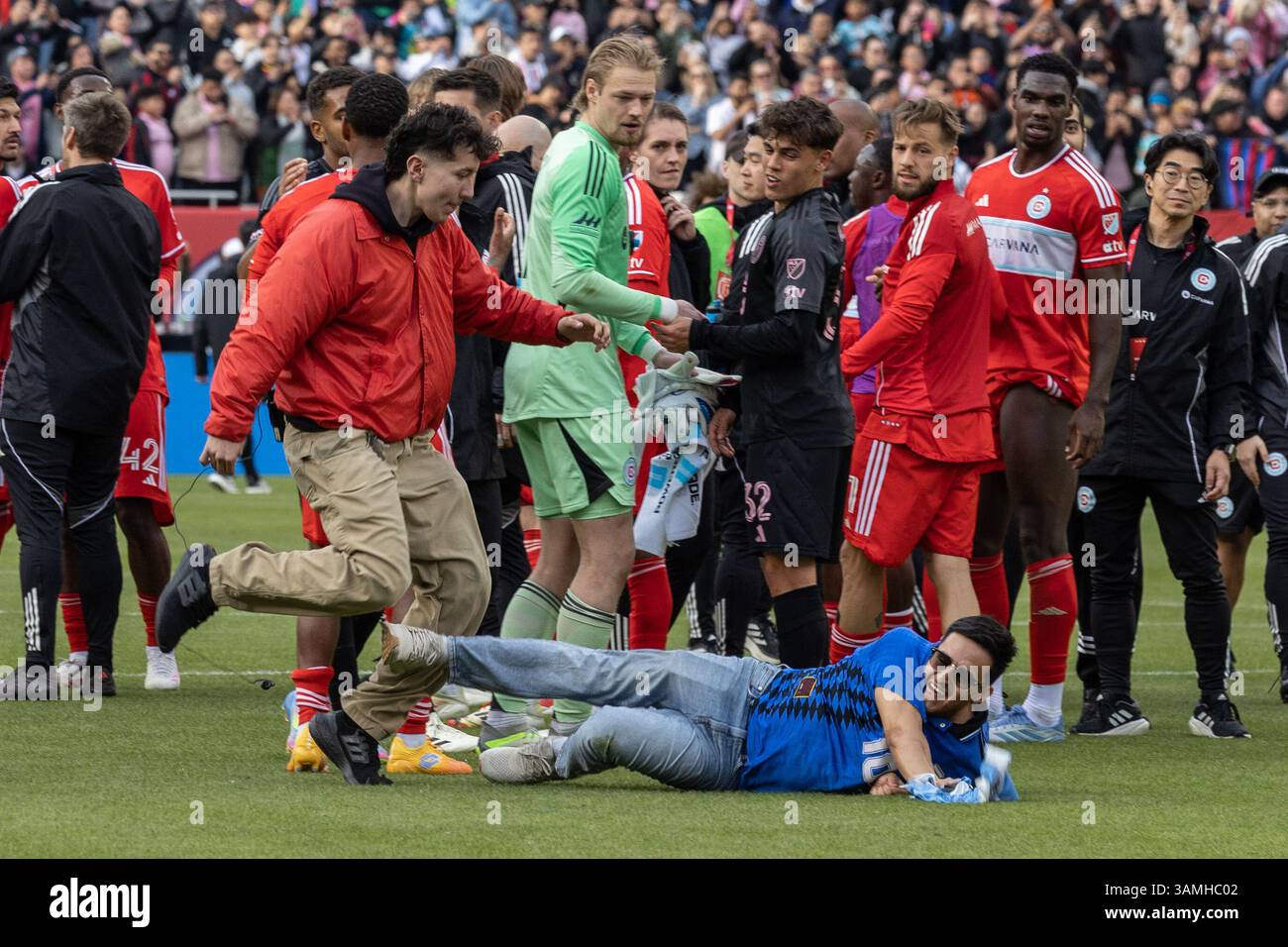 Chicago, USA, April 13, 2025: Supporters of Chicago Fire FC is tackles ...