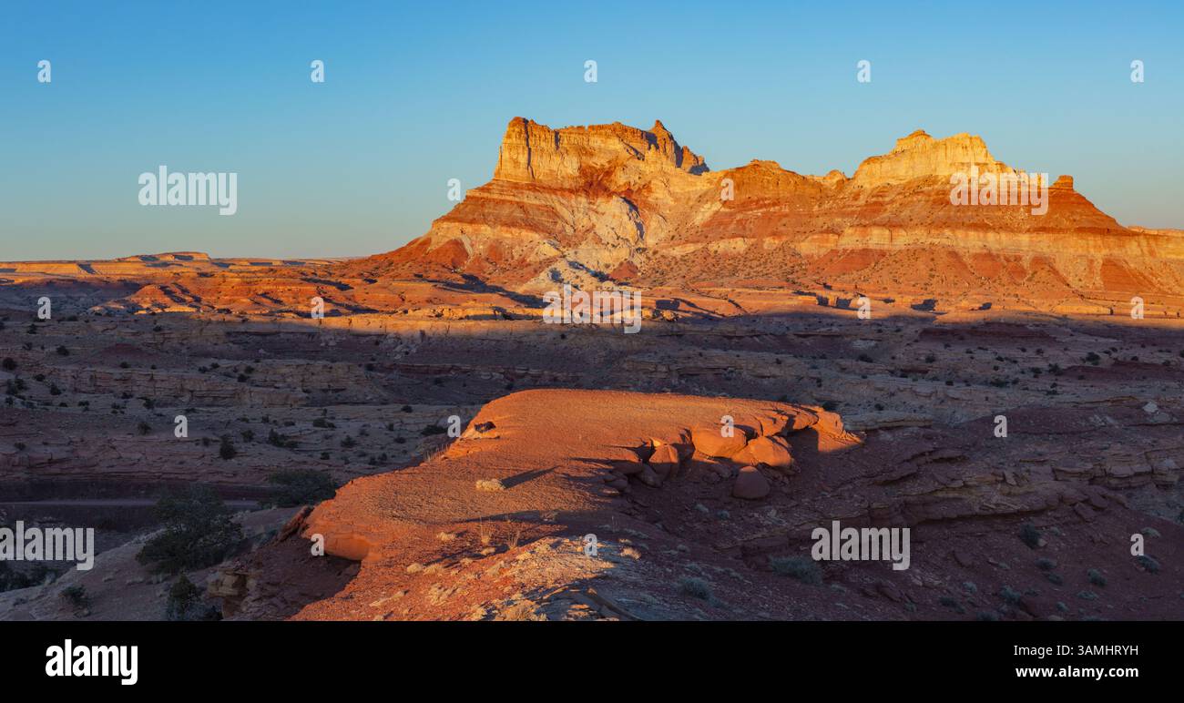 The hills and rock formations surrounding colorful Temple Mountain are ...