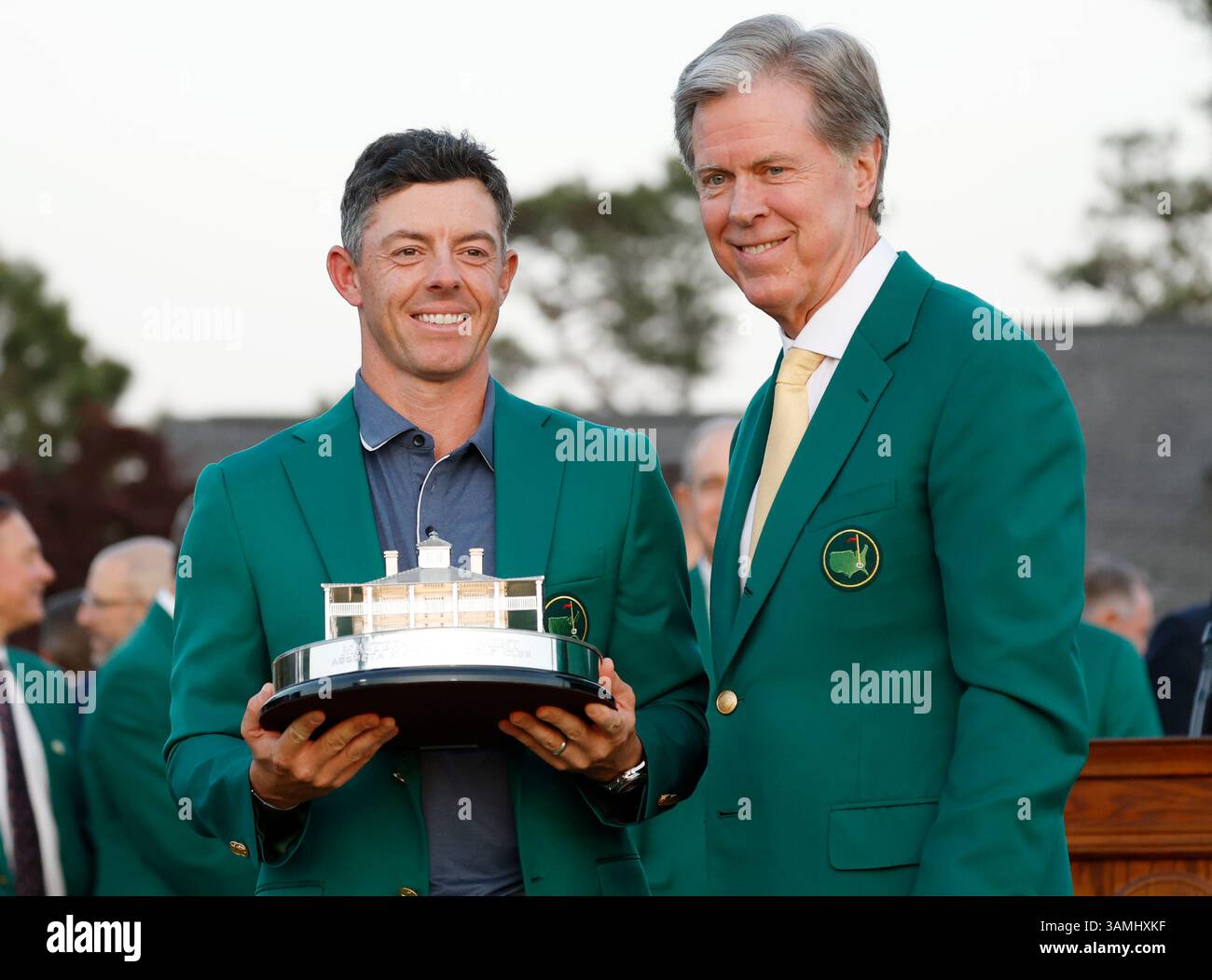 Augusta, United States. 13th Apr, 2025. Rory McIlroy holds his trophy ...