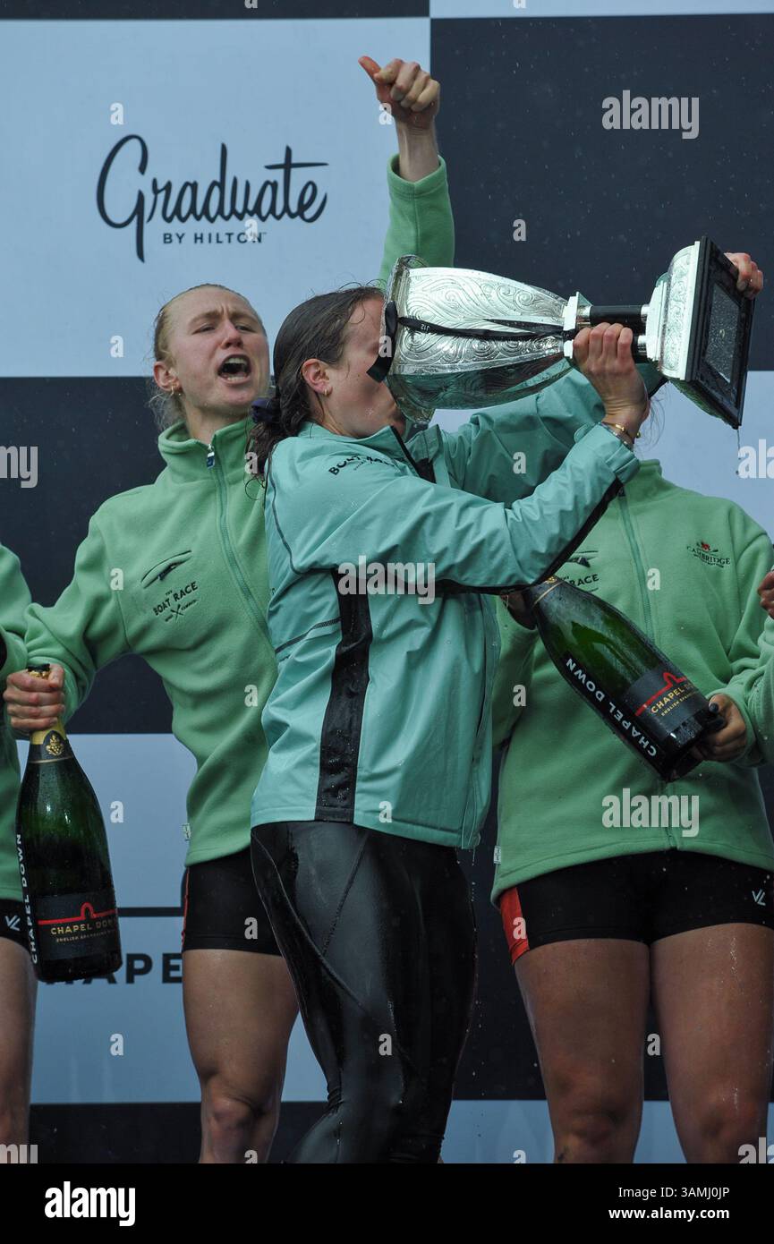 London, UK. 13th Apr, 2025. Cambridge president Lucy Havard drinks from ...