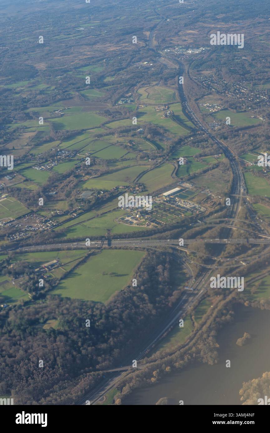 Aerial view of London outskirts suburbs from an aeroplane window, UK ...