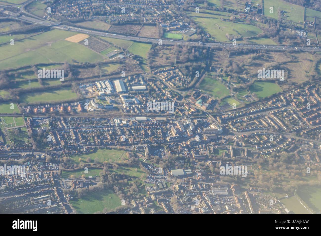 Aerial view of London outskirts suburbs from an aeroplane window, UK ...